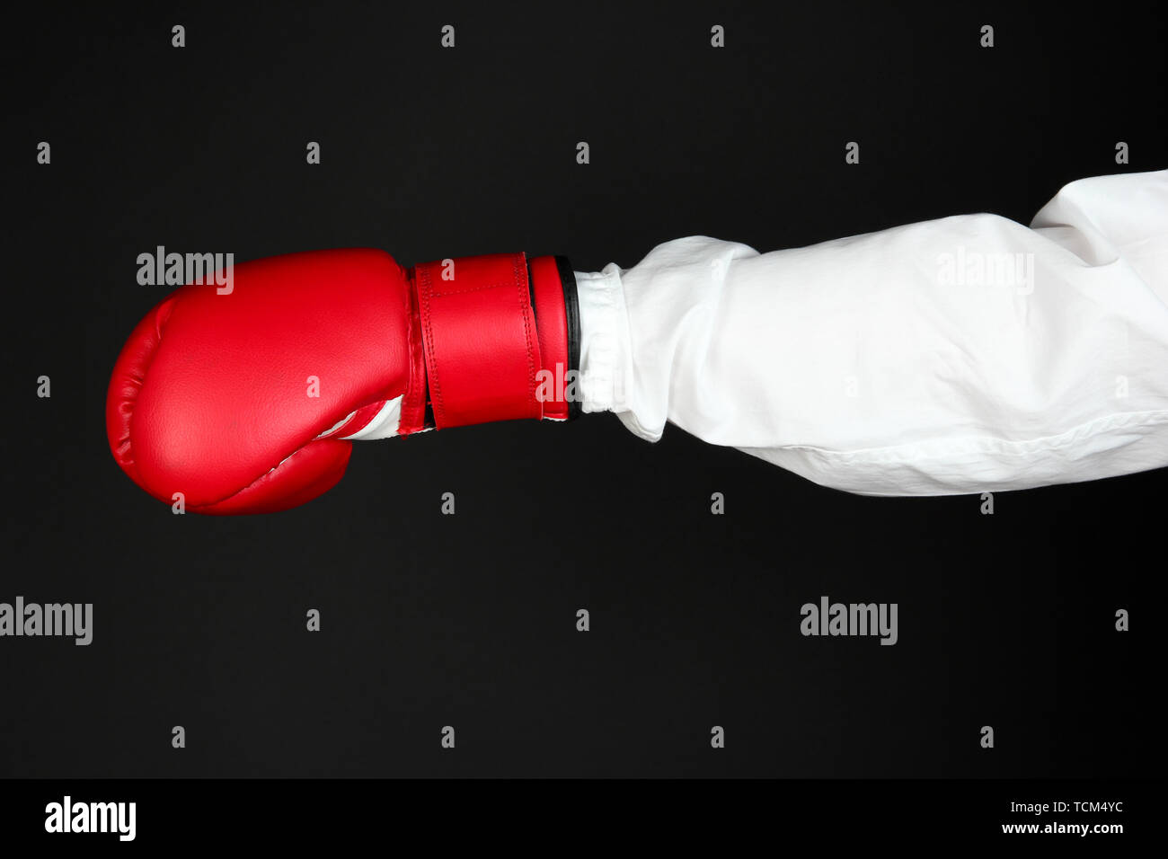 hand in boxing glove isolated on black Stock Photo - Alamy