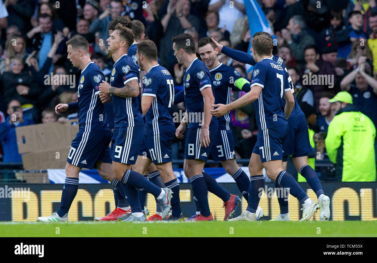 Scotland's Andy Robertson celebrates scoring his side's opening goal ...