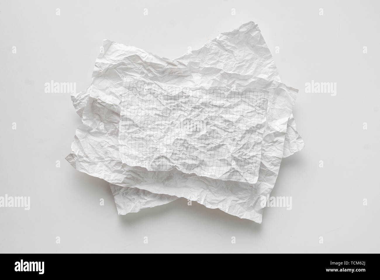 flat lay crumpled white paper sheet isolated on the table, background ...