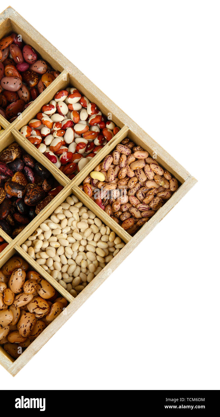 Diverse beans in wooden box sections isolated on white Stock Photo - Alamy