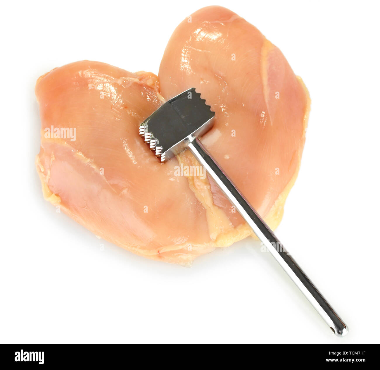raw chicken with a meat hammer isolated on white Stock Photo - Alamy