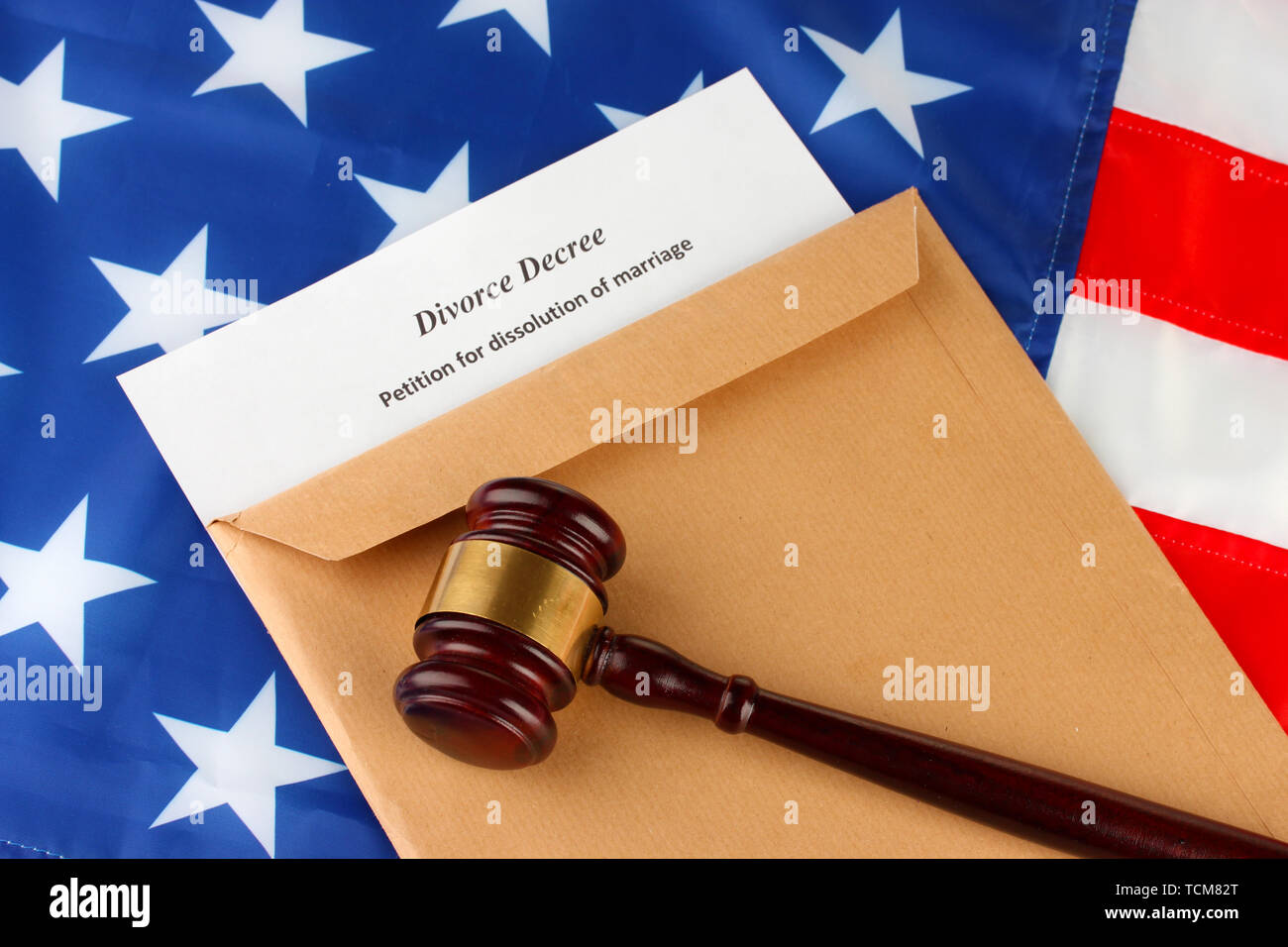 Divorce decree and envelope on american flag background Stock Photo - Alamy