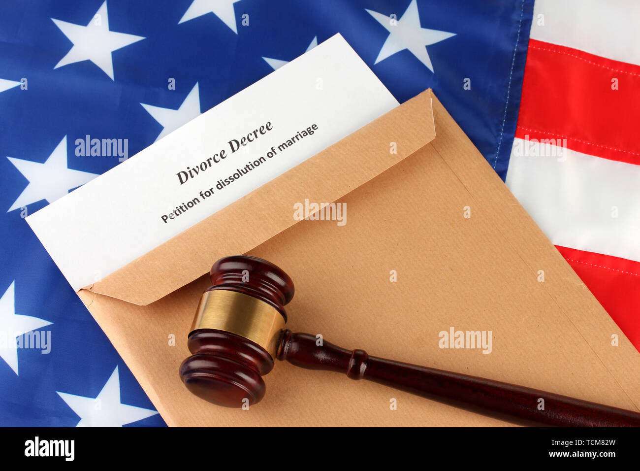 Divorce decree and envelope on american flag background Stock Photo - Alamy