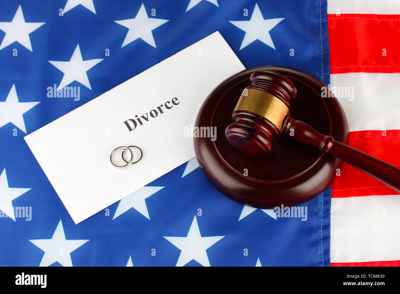 Divorce decree and wooden gavel on american flag background Stock Photo ...