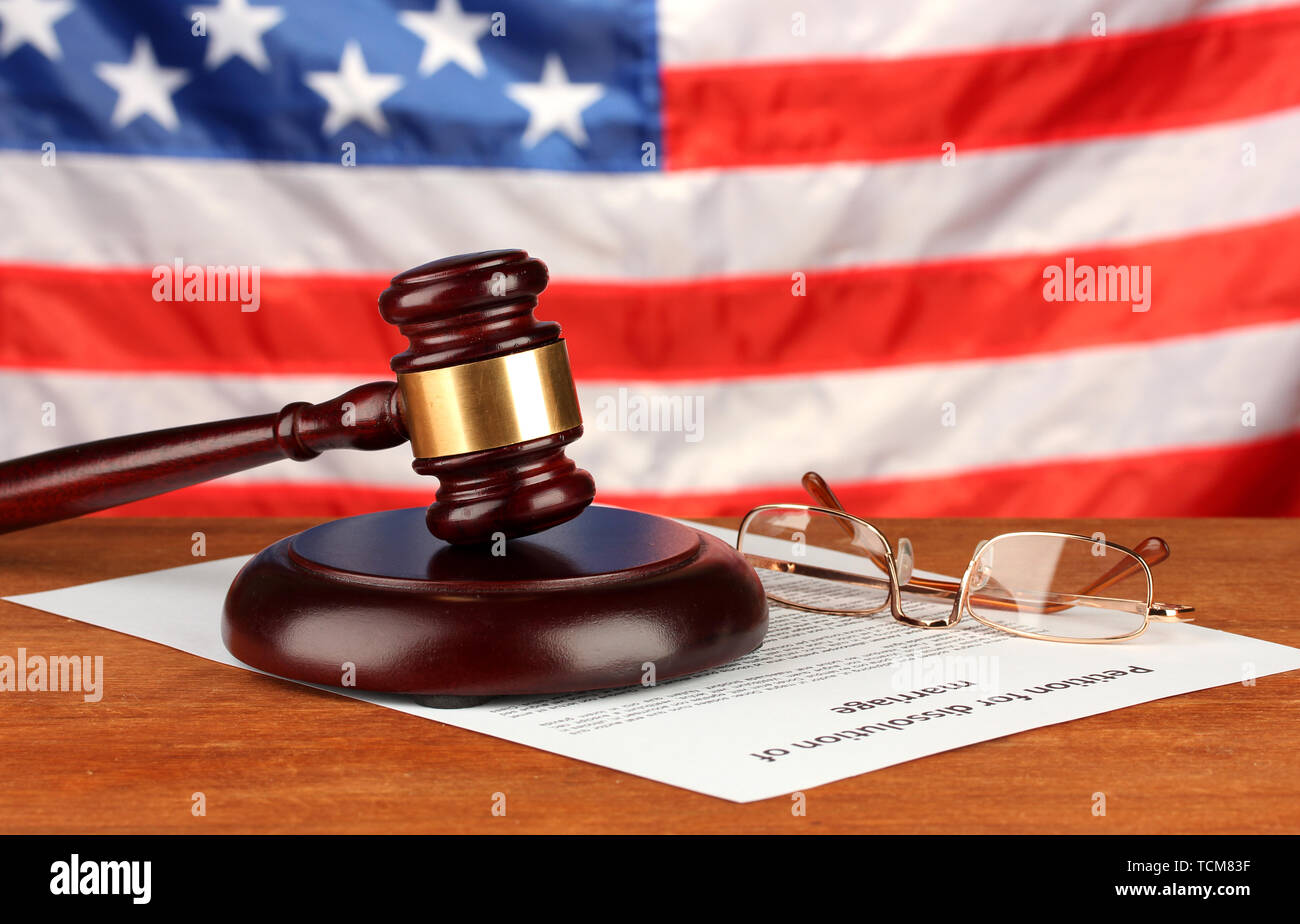 Divorce decree and wooden gavel on american flag background Stock Photo ...