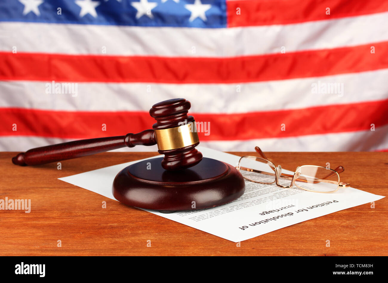 Divorce decree and wooden gavel on american flag background Stock Photo ...