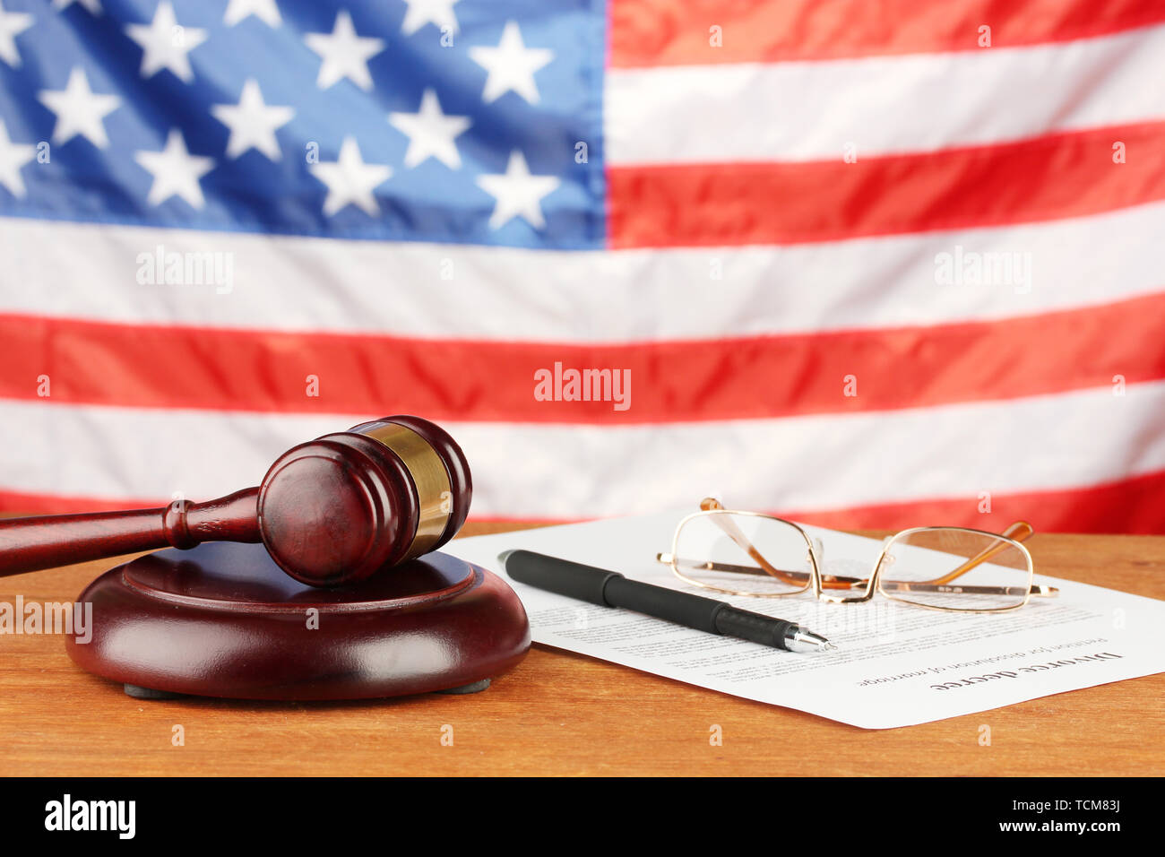 Divorce decree and wooden gavel on american flag background Stock Photo ...