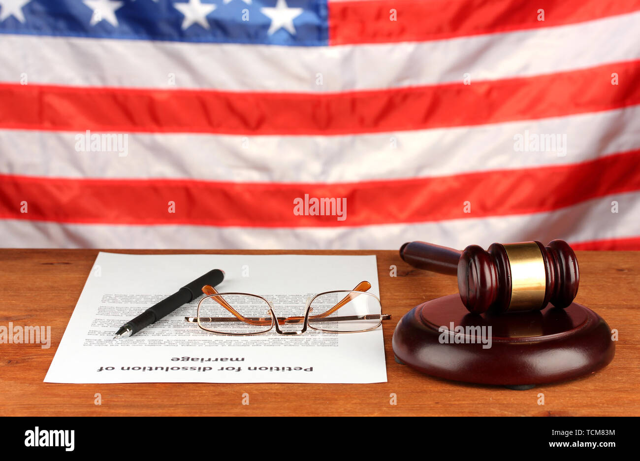Divorce decree and wooden gavel on american flag background Stock Photo ...