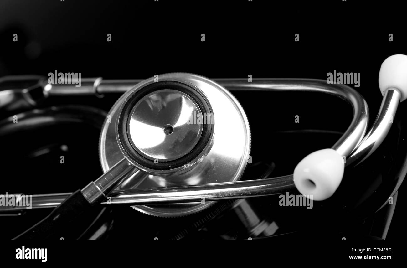 Physician stethoscope isolated on Black and White Stock Photos & Images ...