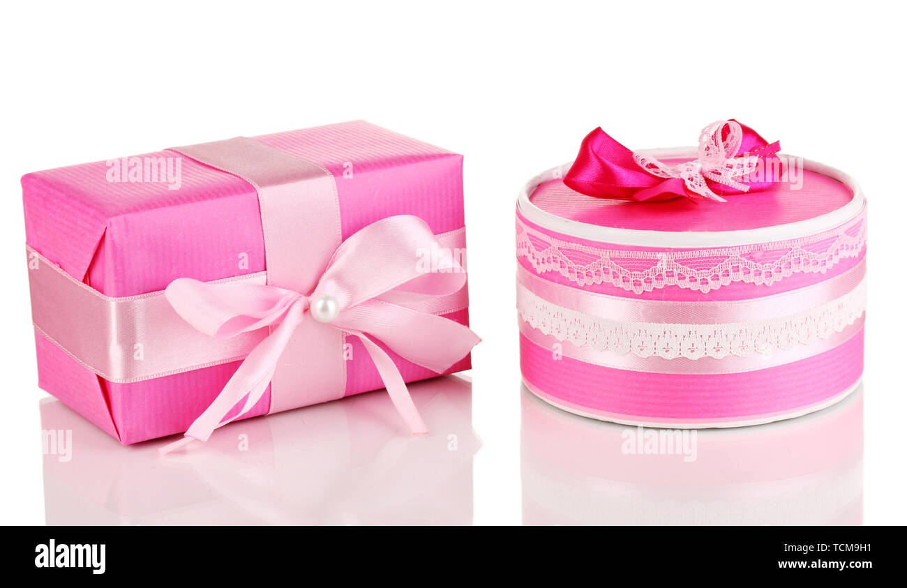 Colorful pink gifts isolated on white Stock Photo - Alamy
