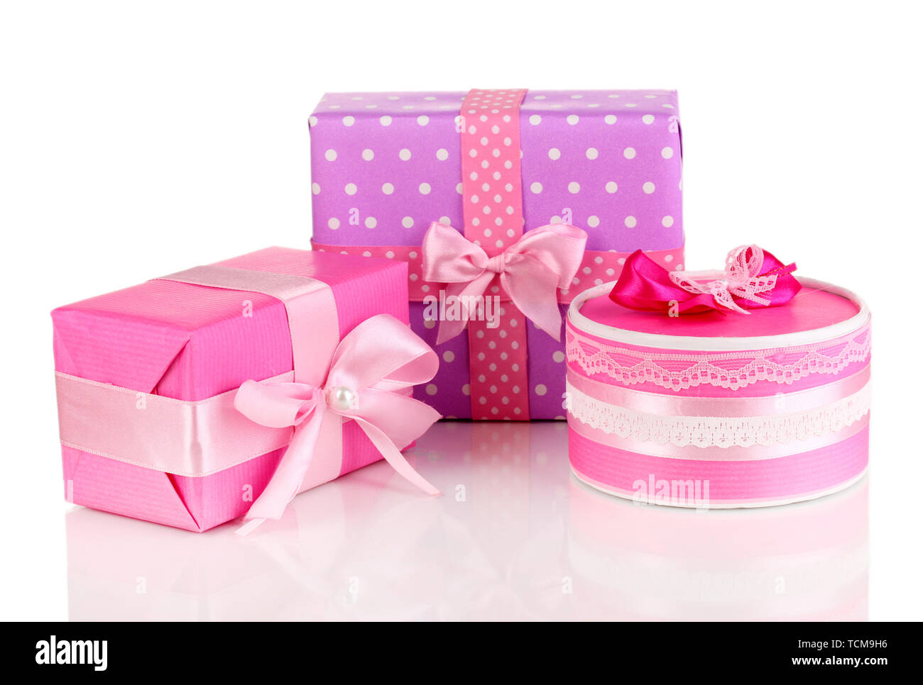 Colorful pink and purple gifts isolated on white Stock Photo - Alamy