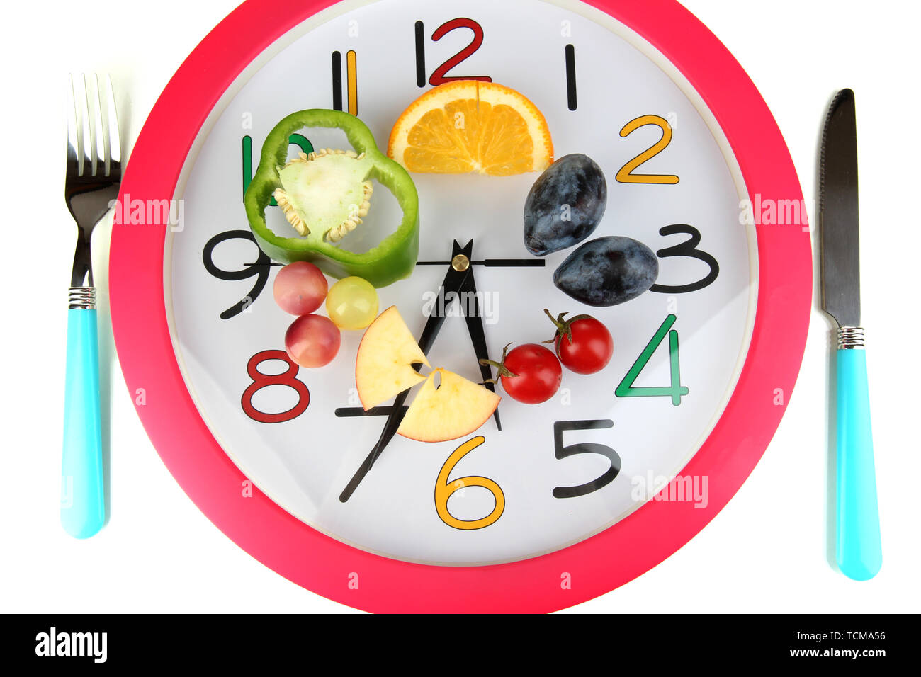 Dietary food on time isolated on white Stock Photo - Alamy