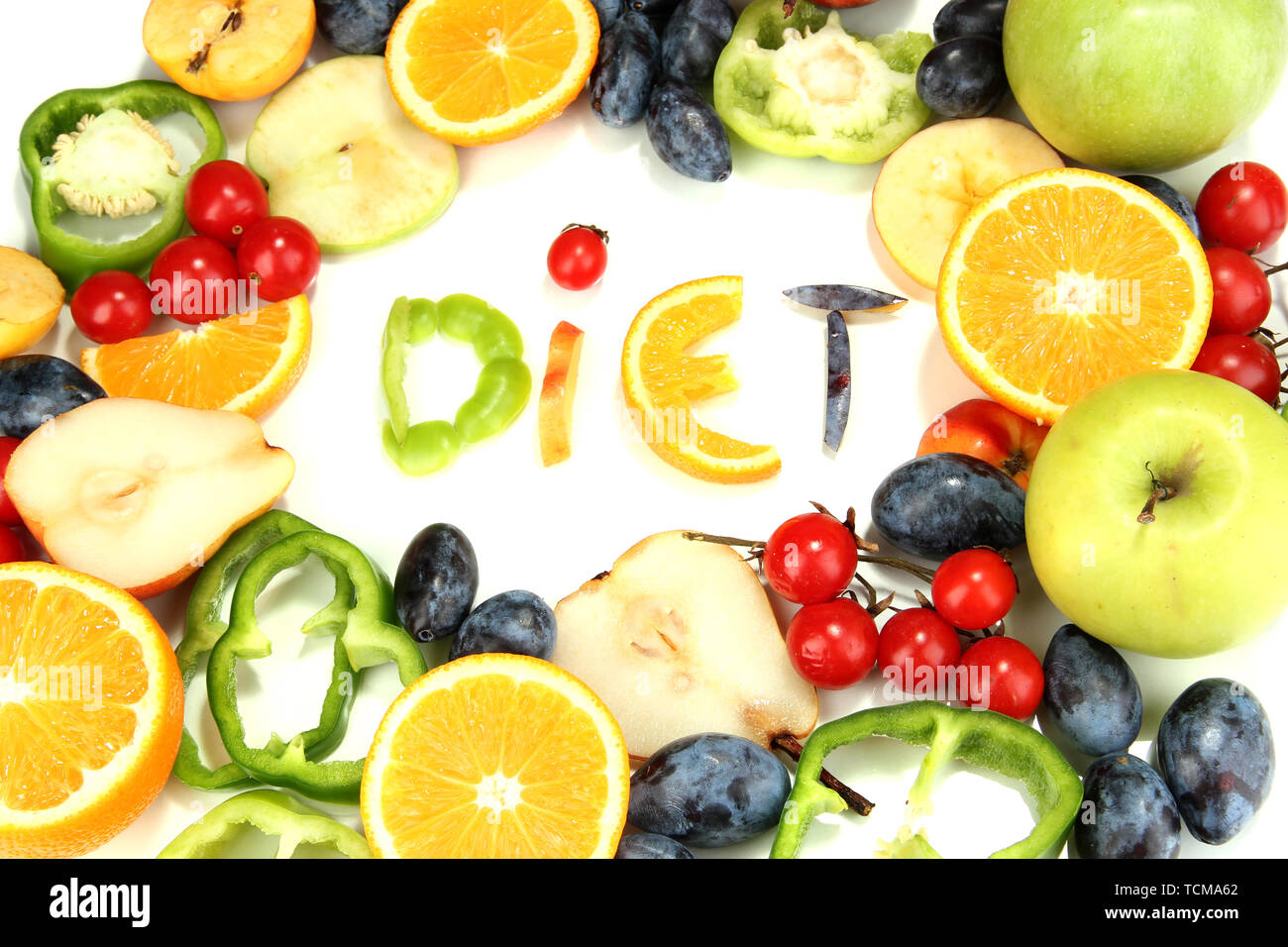 The word Diet lined with pieces of fruits and vegetables isolated on ...