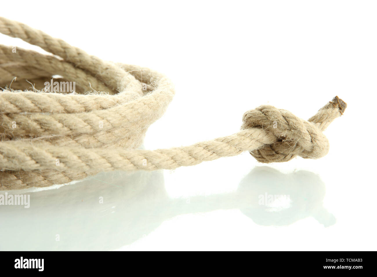 roll of rope with knot, isolated on white Stock Photo - Alamy