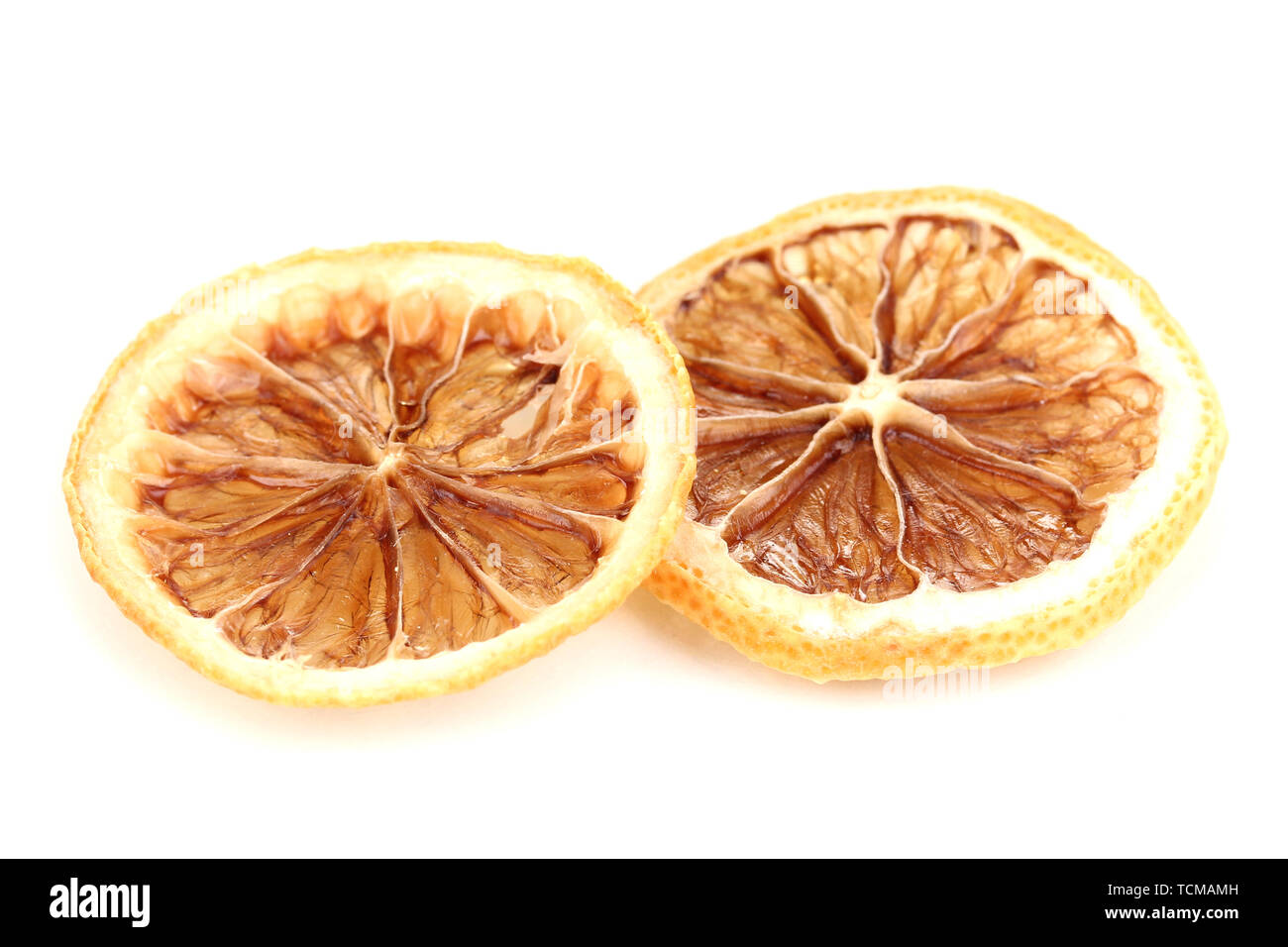 dried lemon isolated on white Stock Photo - Alamy