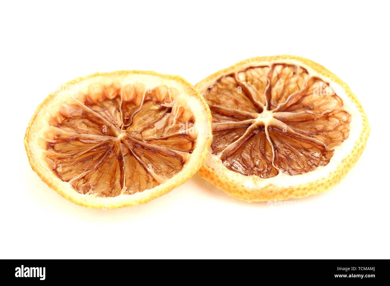 dried lemon isolated on white Stock Photo - Alamy