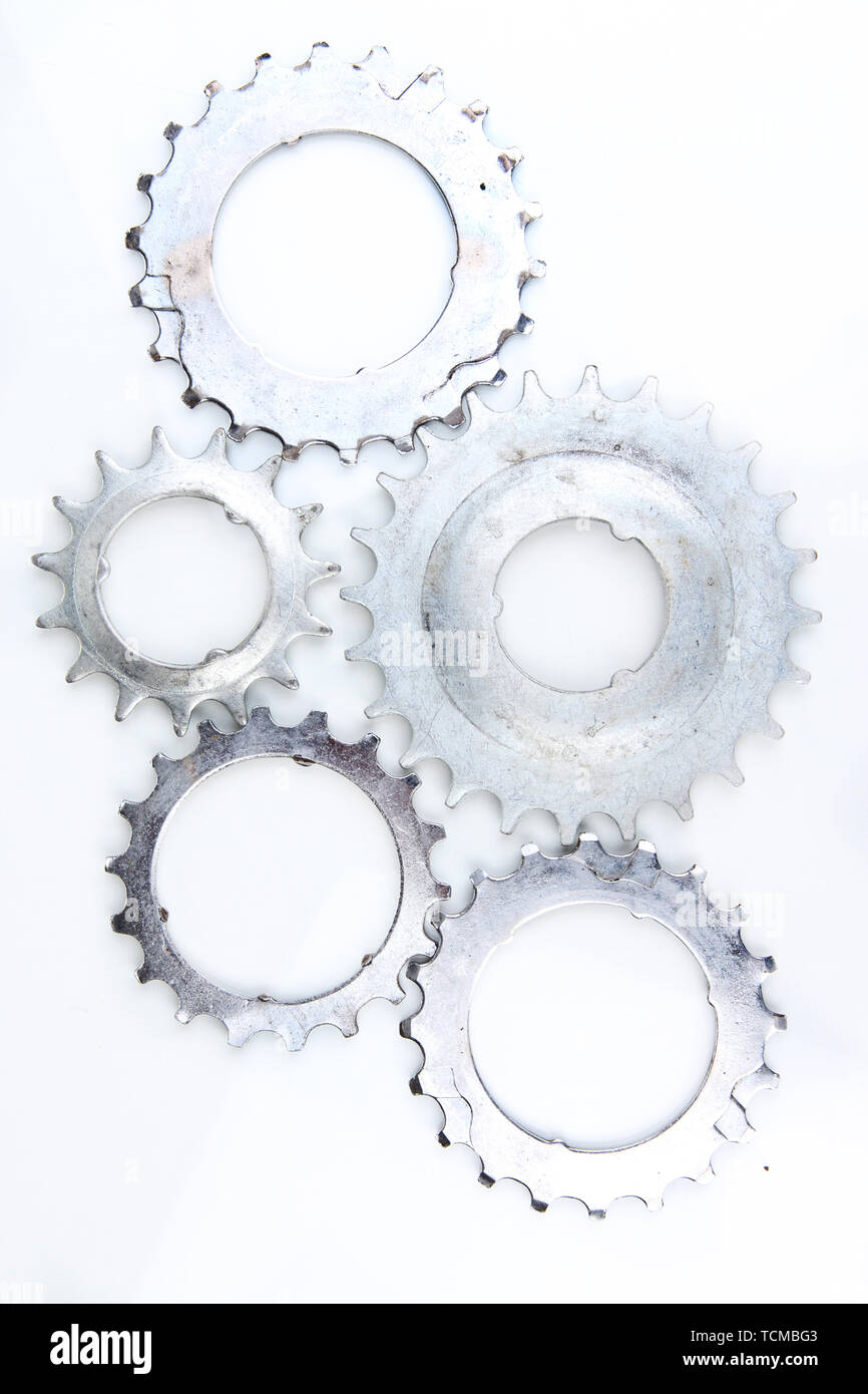Metal cogwheels isolated on white Stock Photo - Alamy