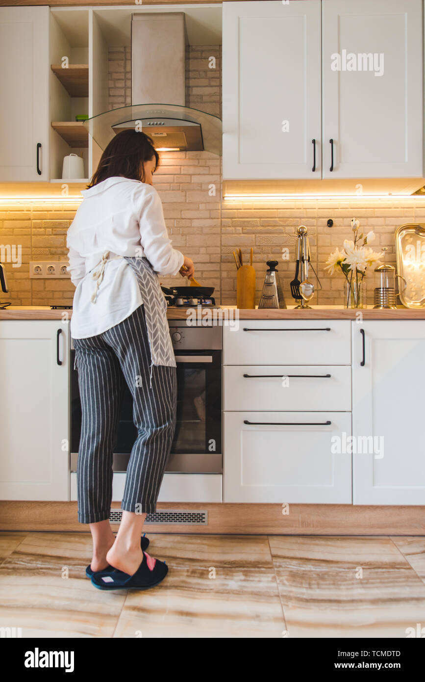 Woman oven rear hi-res stock photography and images - Alamy