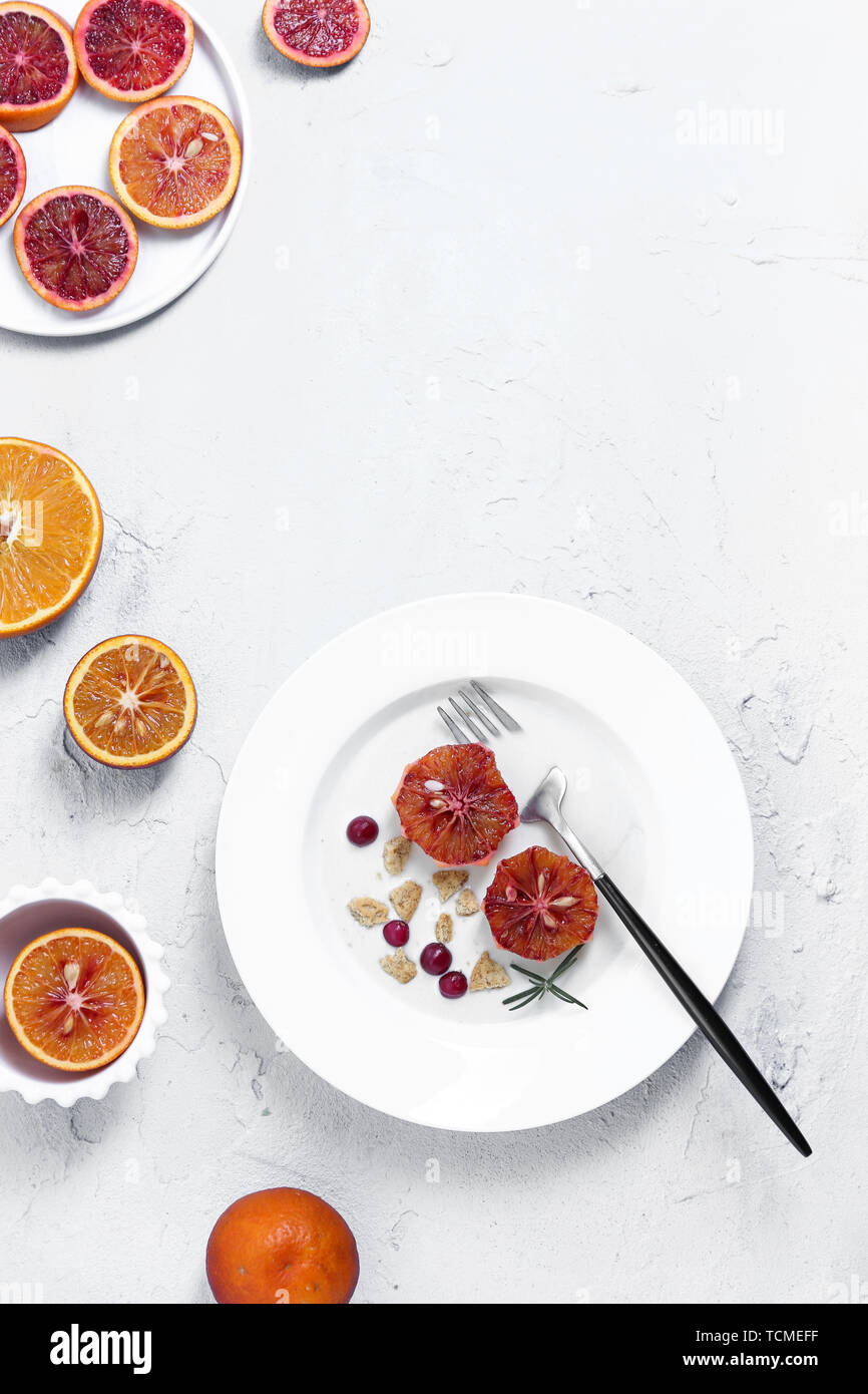 One person eating yogurt cereal fruit breakfast on white background ...