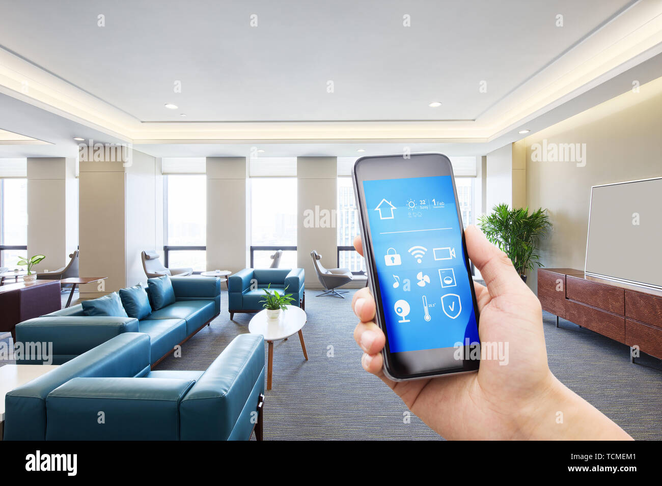 Mobile phone in modern living room Stock Photo - Alamy
