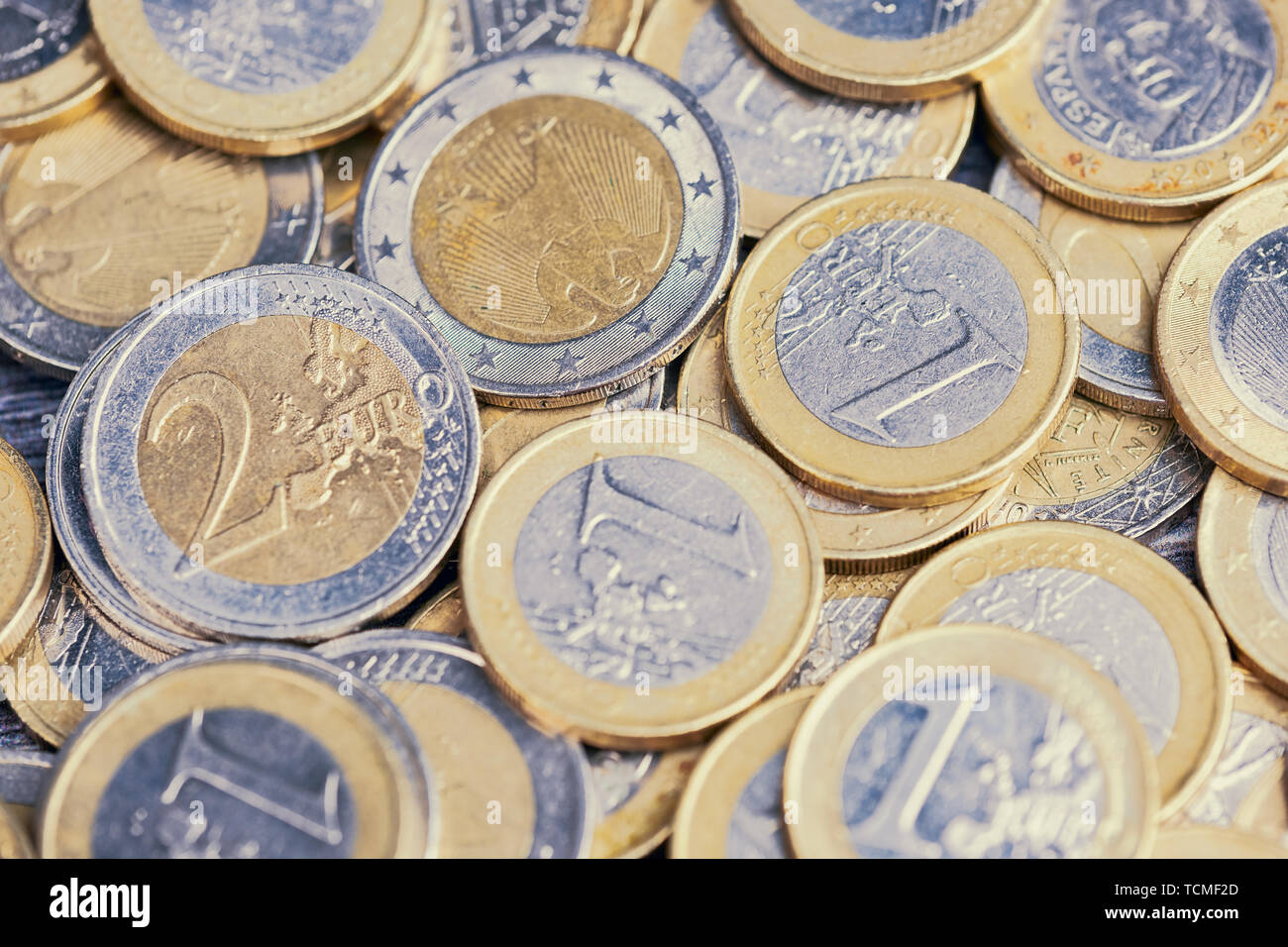 colored picture background with one and two Euro coins, format filling ...