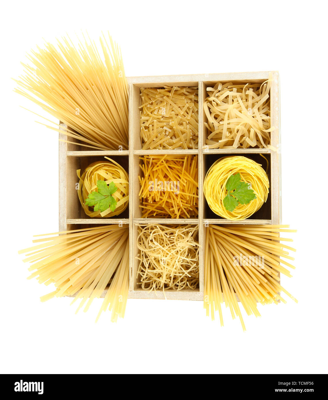 Nine types of pasta in wooden box sections isolated on white Stock ...