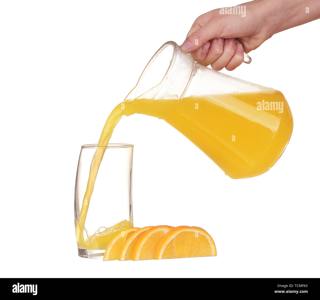 orange juice pouring into glass Stock Photo - Alamy
