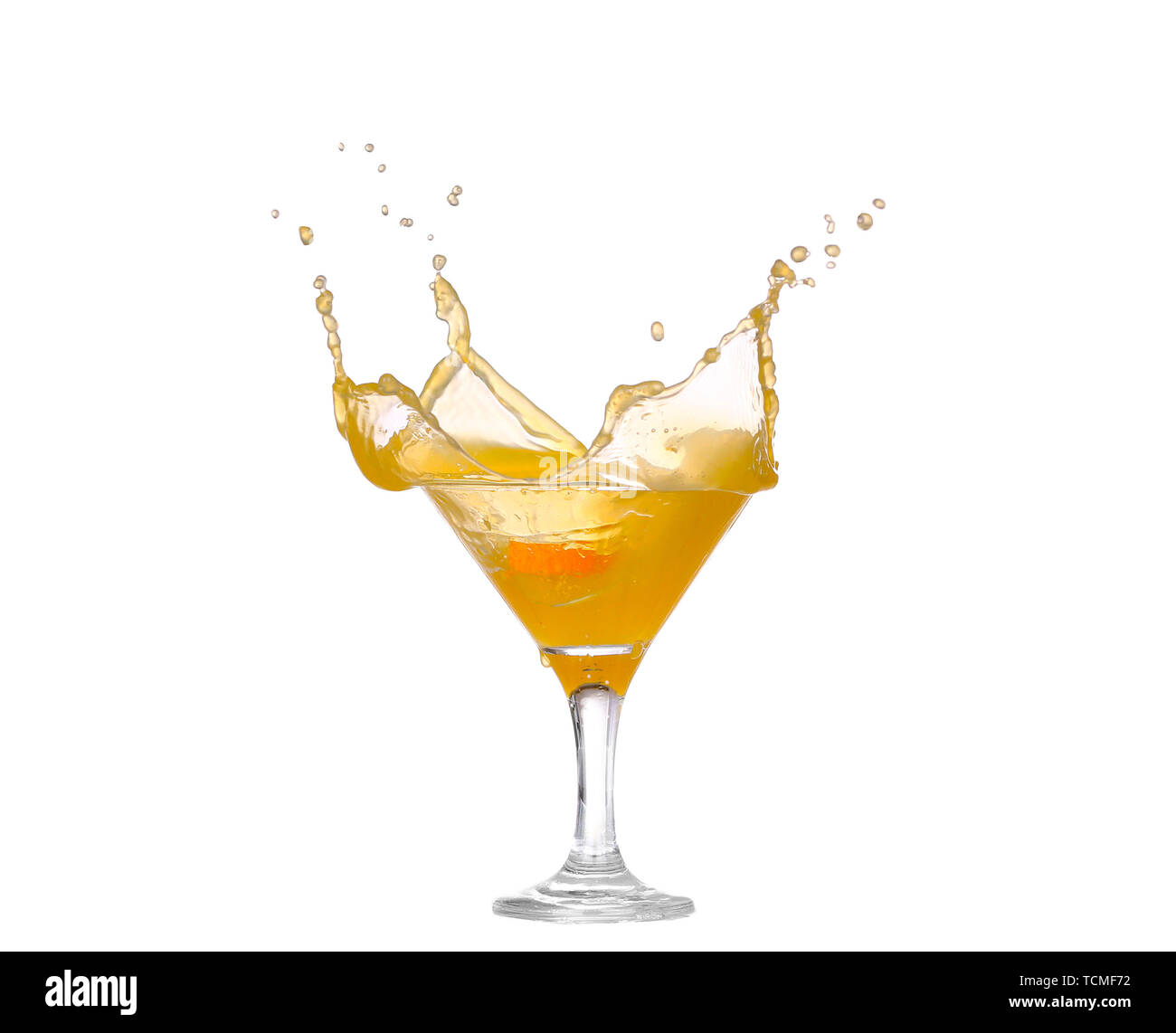 splash of orange juice in a glass isolated on white Stock Photo - Alamy