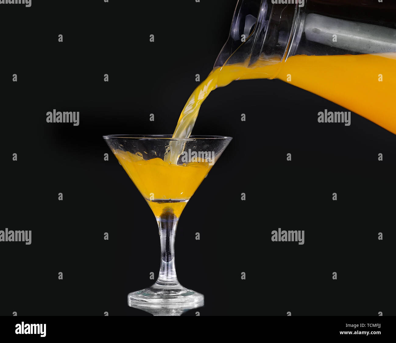 pouring orange juice into glass, Fresh pouring orange juice with fruits ...