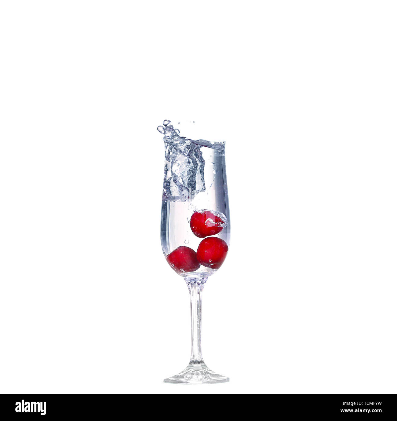 cherry splash in a cocktail glass on white Stock Photo - Alamy