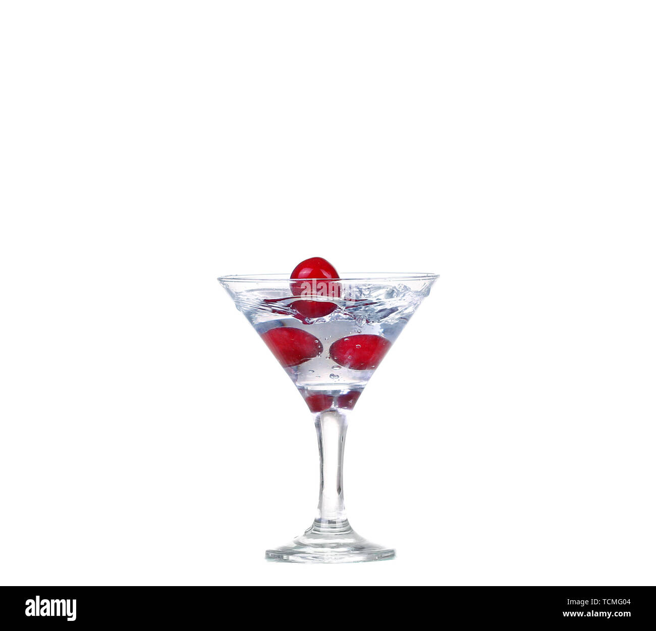 cherry splash in a cocktail glass on white Stock Photo - Alamy