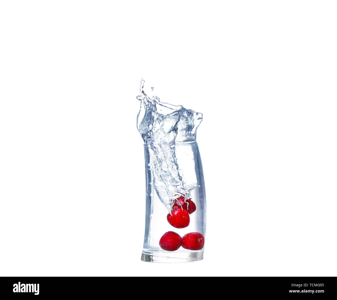 cherry splash in a cocktail glass on white Stock Photo - Alamy