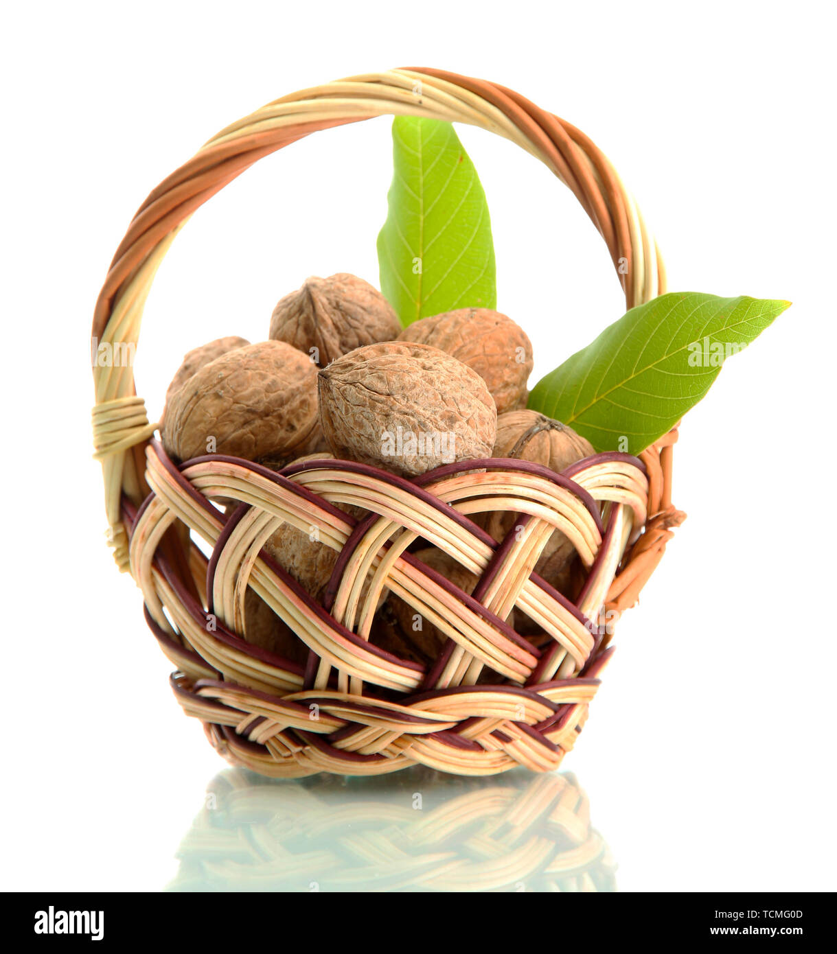 Wooden basket full walnuts hi-res stock photography and images - Alamy