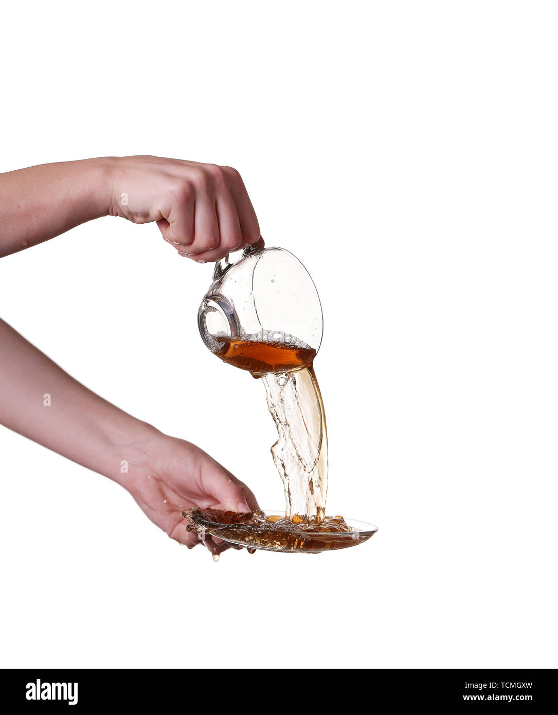 Glass cup of tea with splash Stock Photo - Alamy