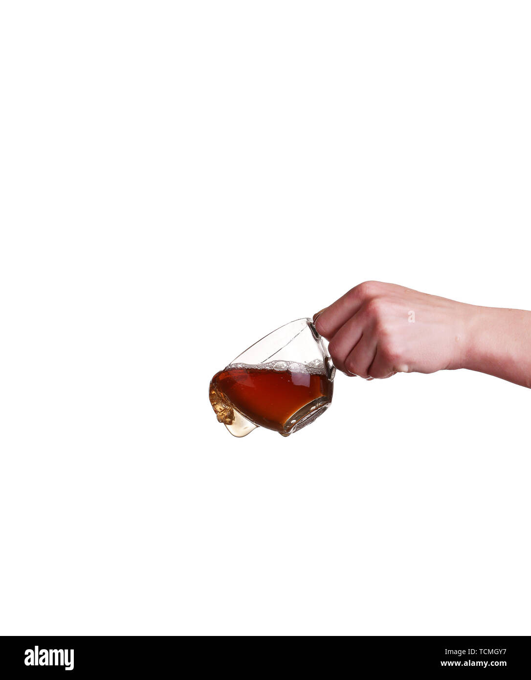 Glass cup of tea with splash Stock Photo - Alamy