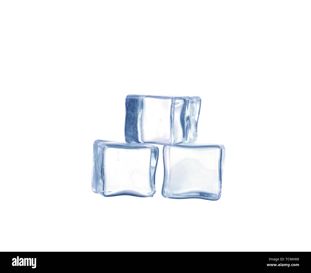 Three ice cubes on white background Stock Photo - Alamy