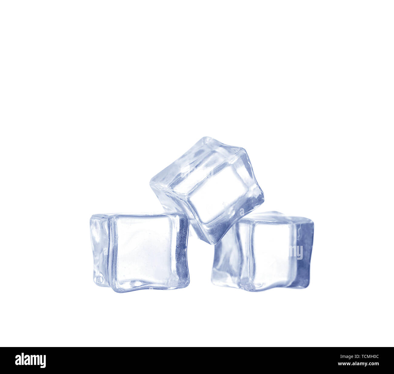 Three ice cubes on white background Stock Photo - Alamy