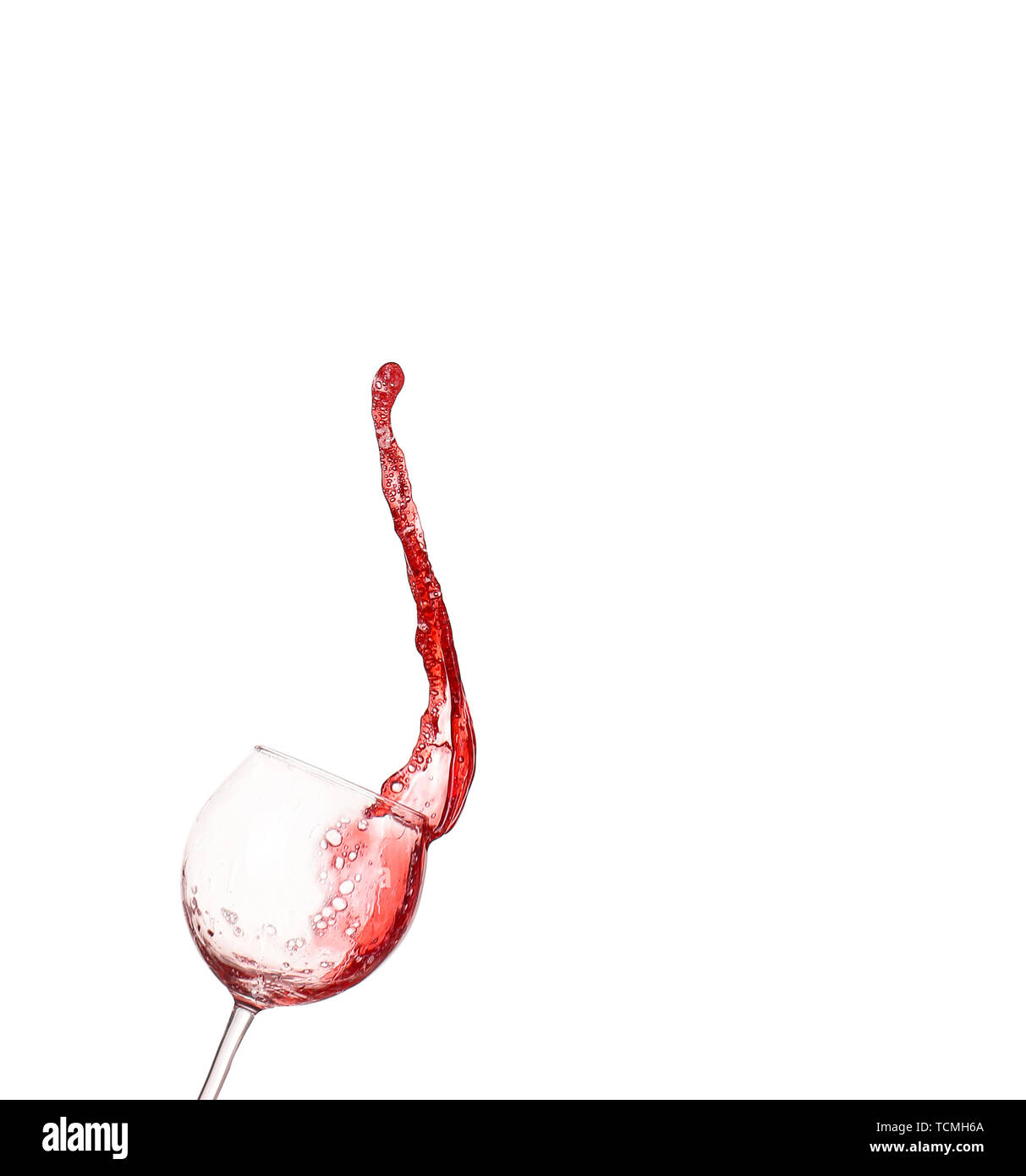Red wine splashing from glass, isolated on white background Stock Photo ...