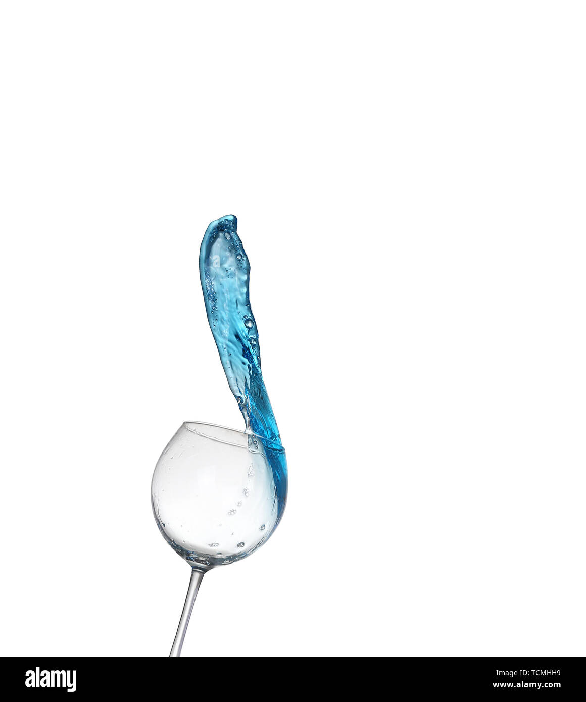 Blue alcoholic cocktail on white isolate splash Stock Photo - Alamy