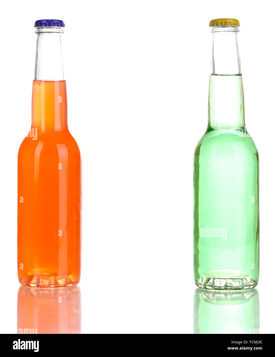 Tasty drinks in bottles isolated on white Stock Photo - Alamy