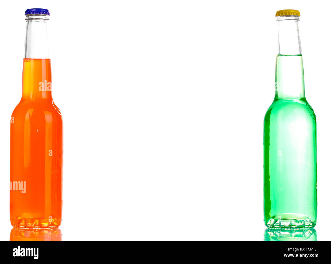 Tasty drinks in bottles isolated on white Stock Photo - Alamy
