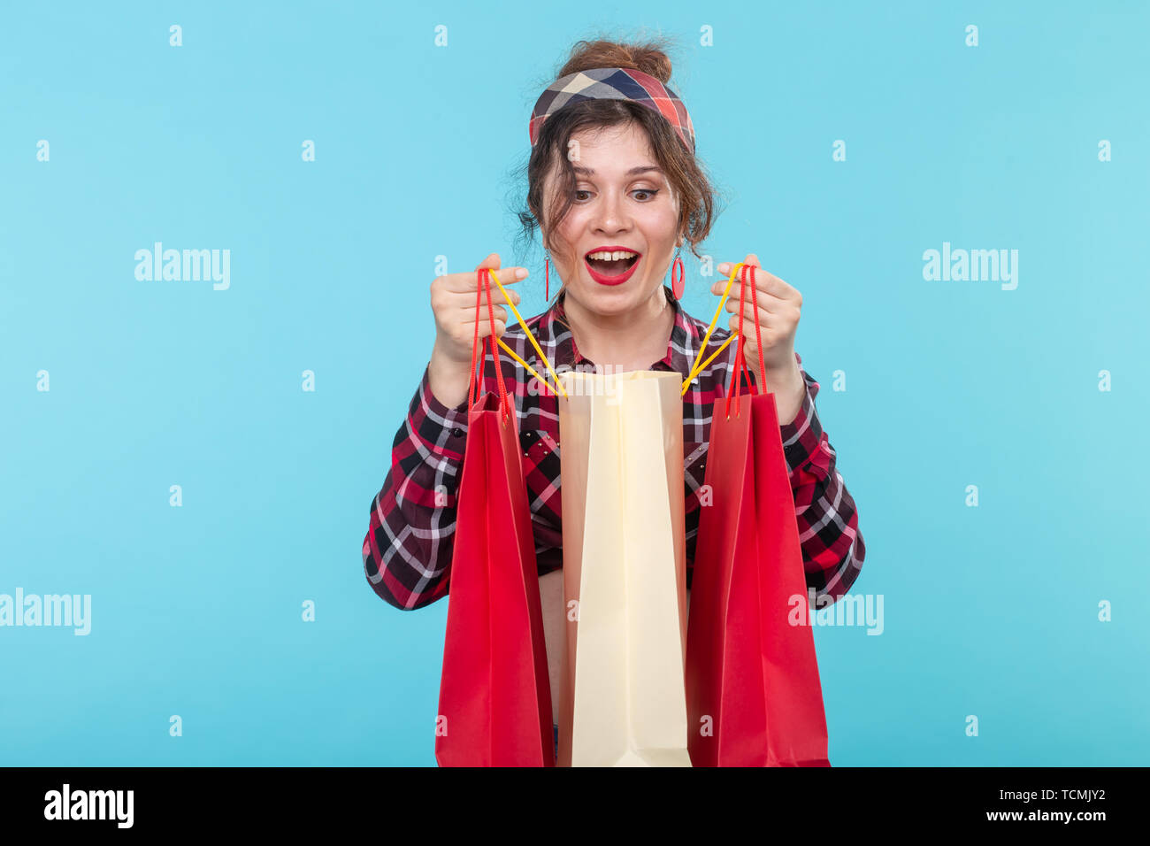 shopping, pin-up, people concept - woman with shopping bags Stock Photo ...