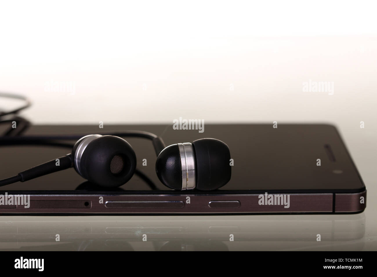 Pair of earphone hi-res stock photography and images - Alamy