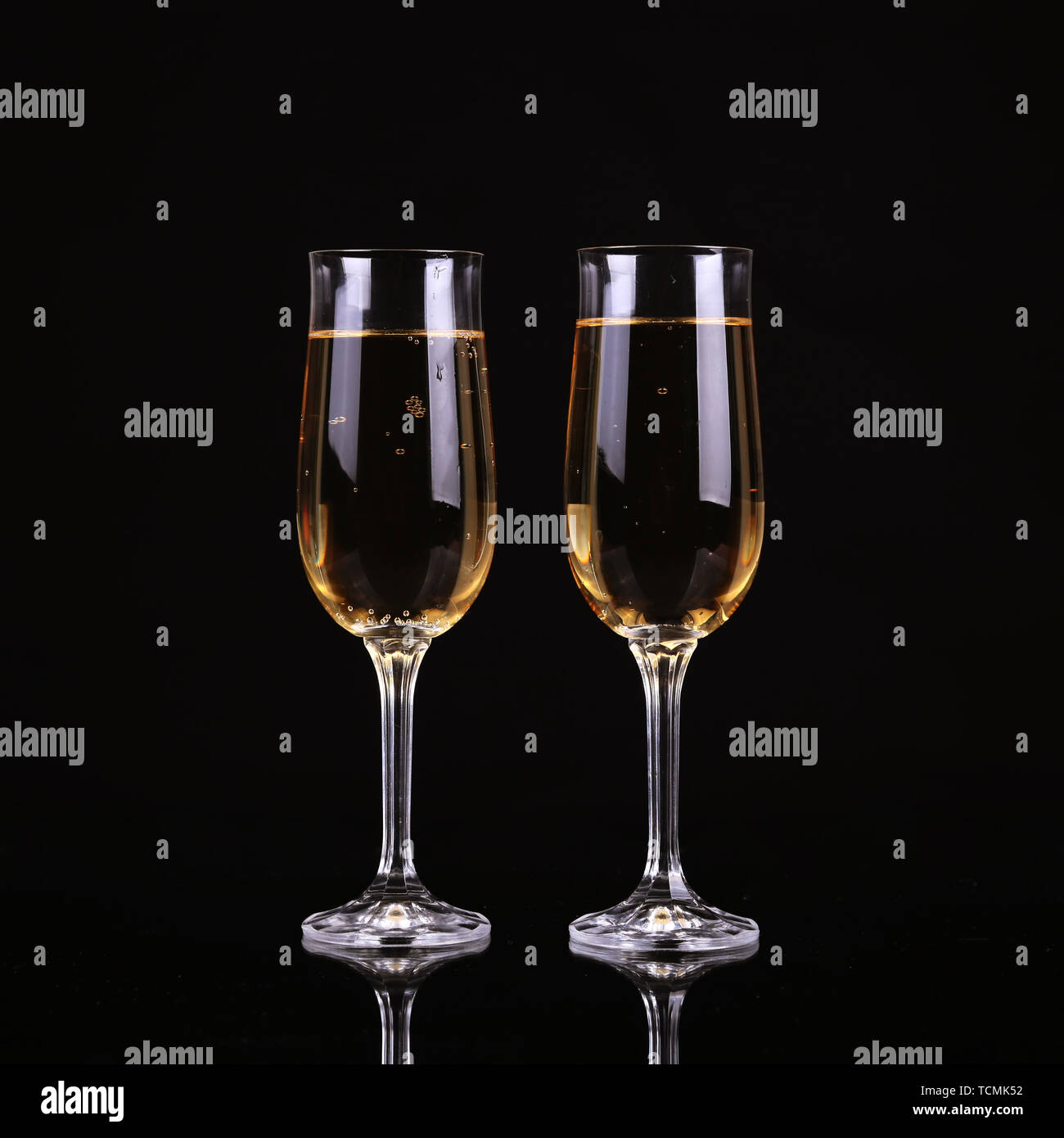 A glass of champagne, on a black background Stock Photo - Alamy