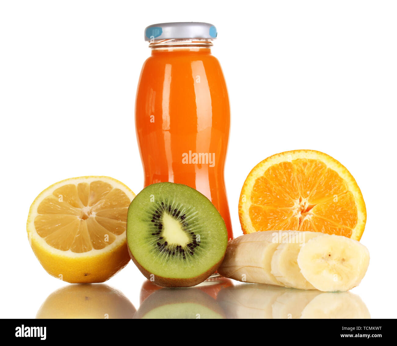 Delicious multifruit juice in a bottle and fruit next to it isolated on ...