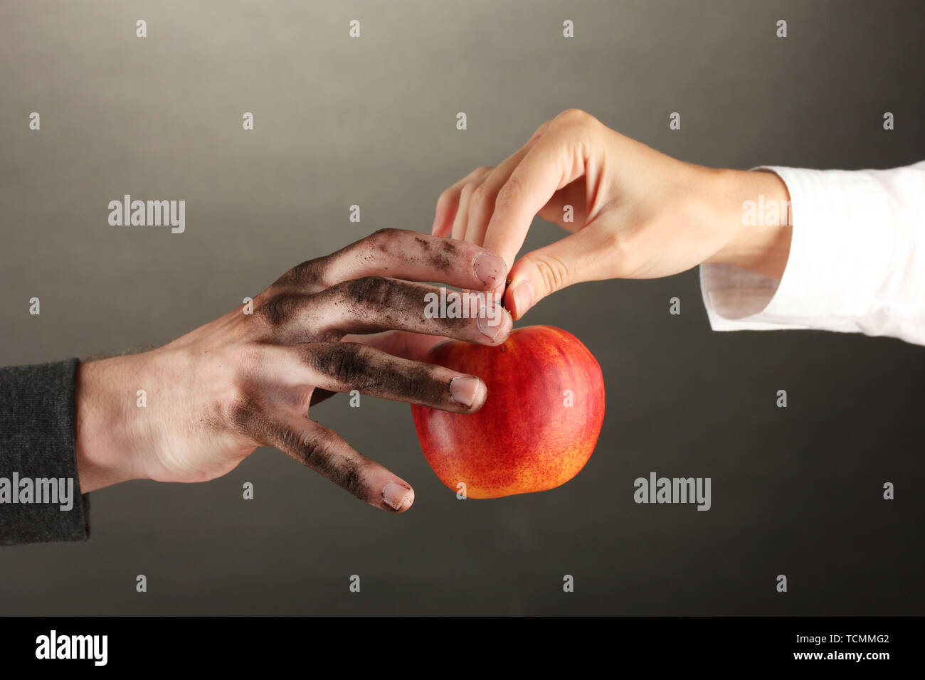 helping the homeless, on black background close-up Stock Photo - Alamy