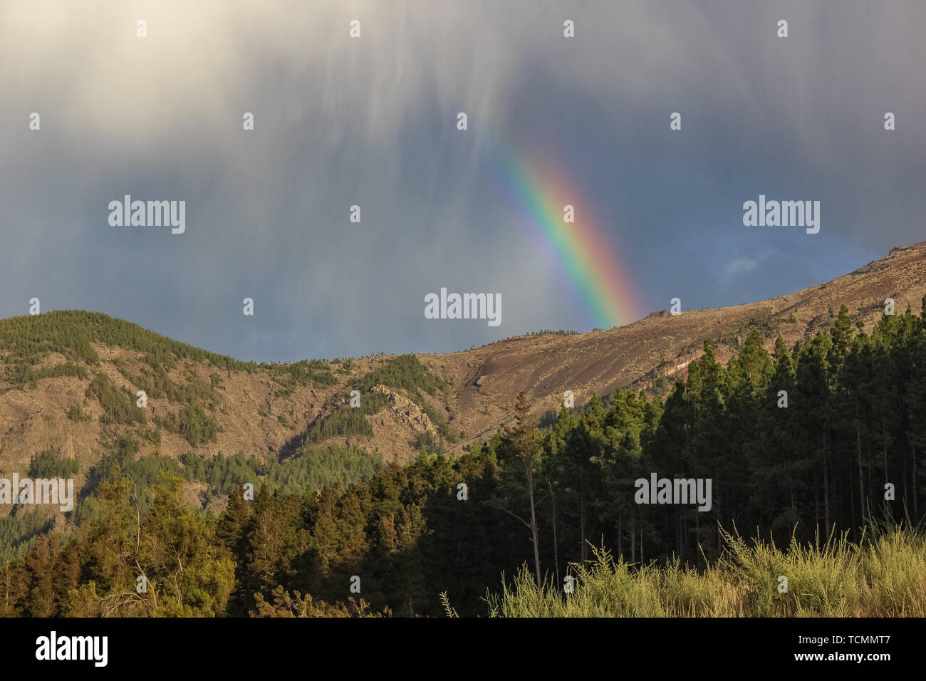 Blue sky with clouds on horizon and rainbow background hi-res stock ...
