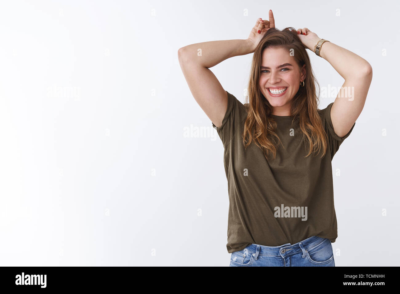 Fingers behind head hi-res stock photography and images - Alamy