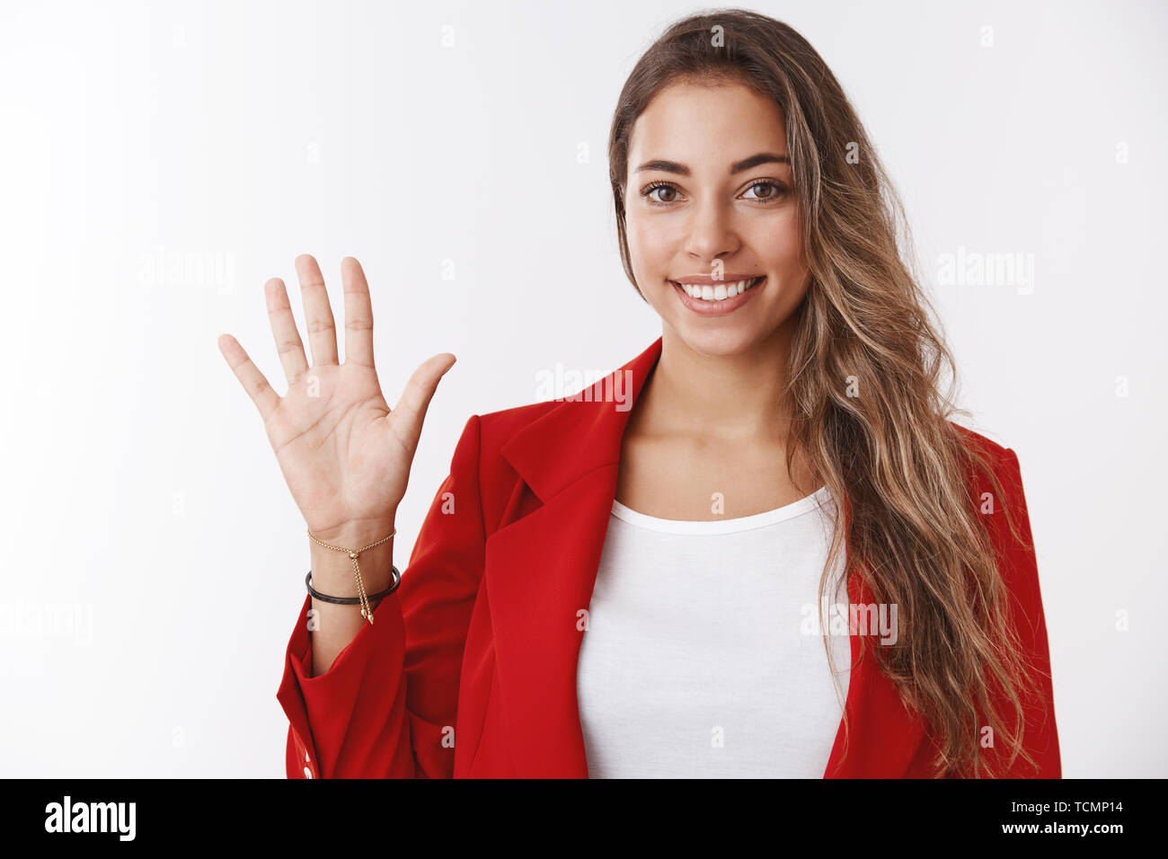 Hello. Girl waving you saying hi friendly smiling looking positive ... Hello. Girl waving you saying hi friendly smiling looking positive ...