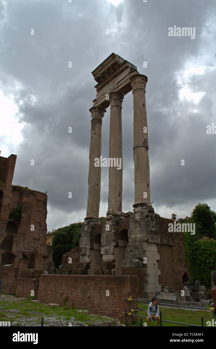Three columns belonging to the ruins of the Temple of Dioscuri ...